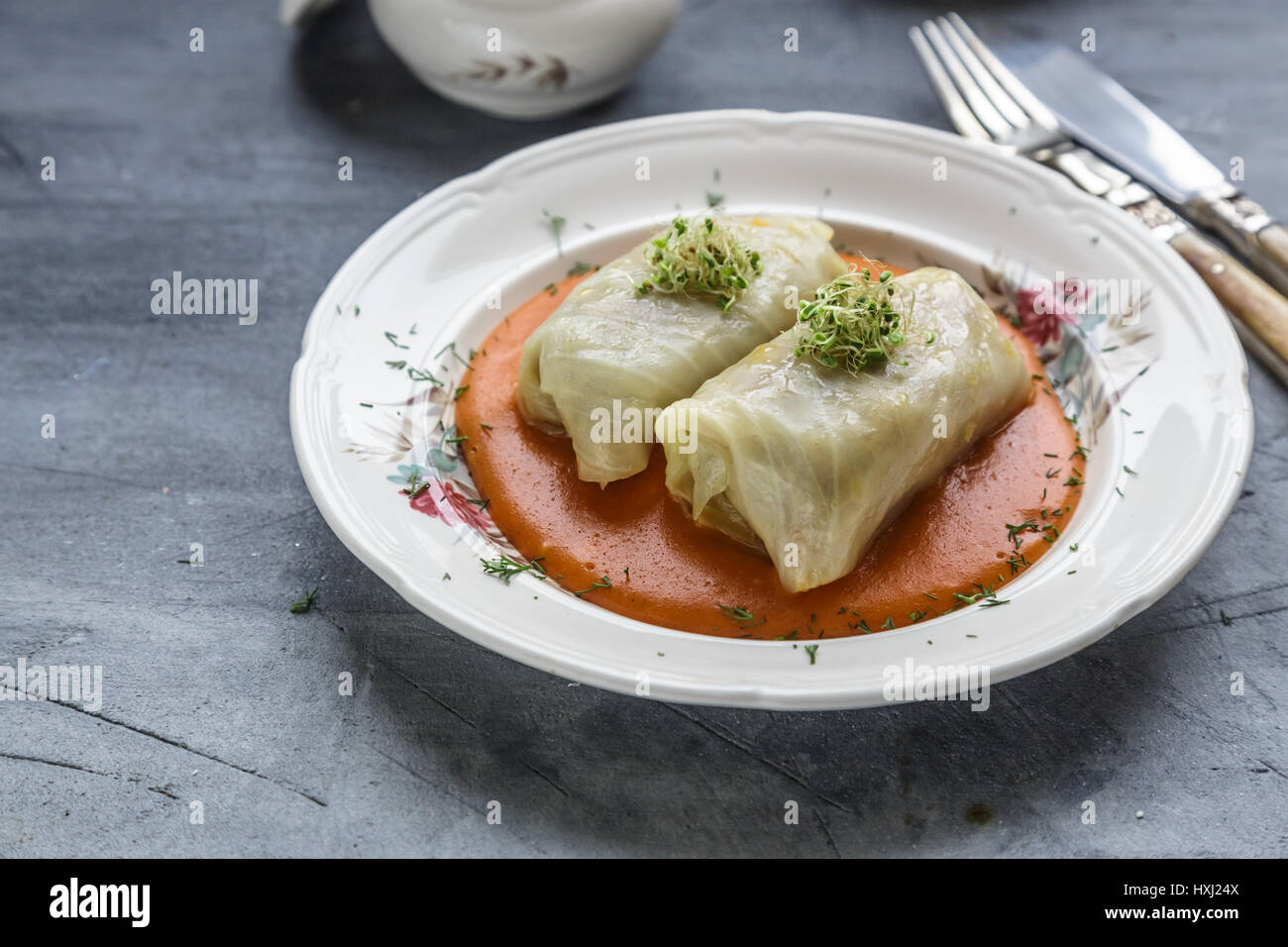 Stuffed cabbage rolls Hungarian cuisine on a white plate Stock Photo ...