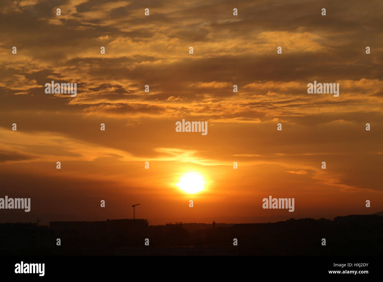 Beautiful sunset in the city photographed in close-up Stock Photo - Alamy