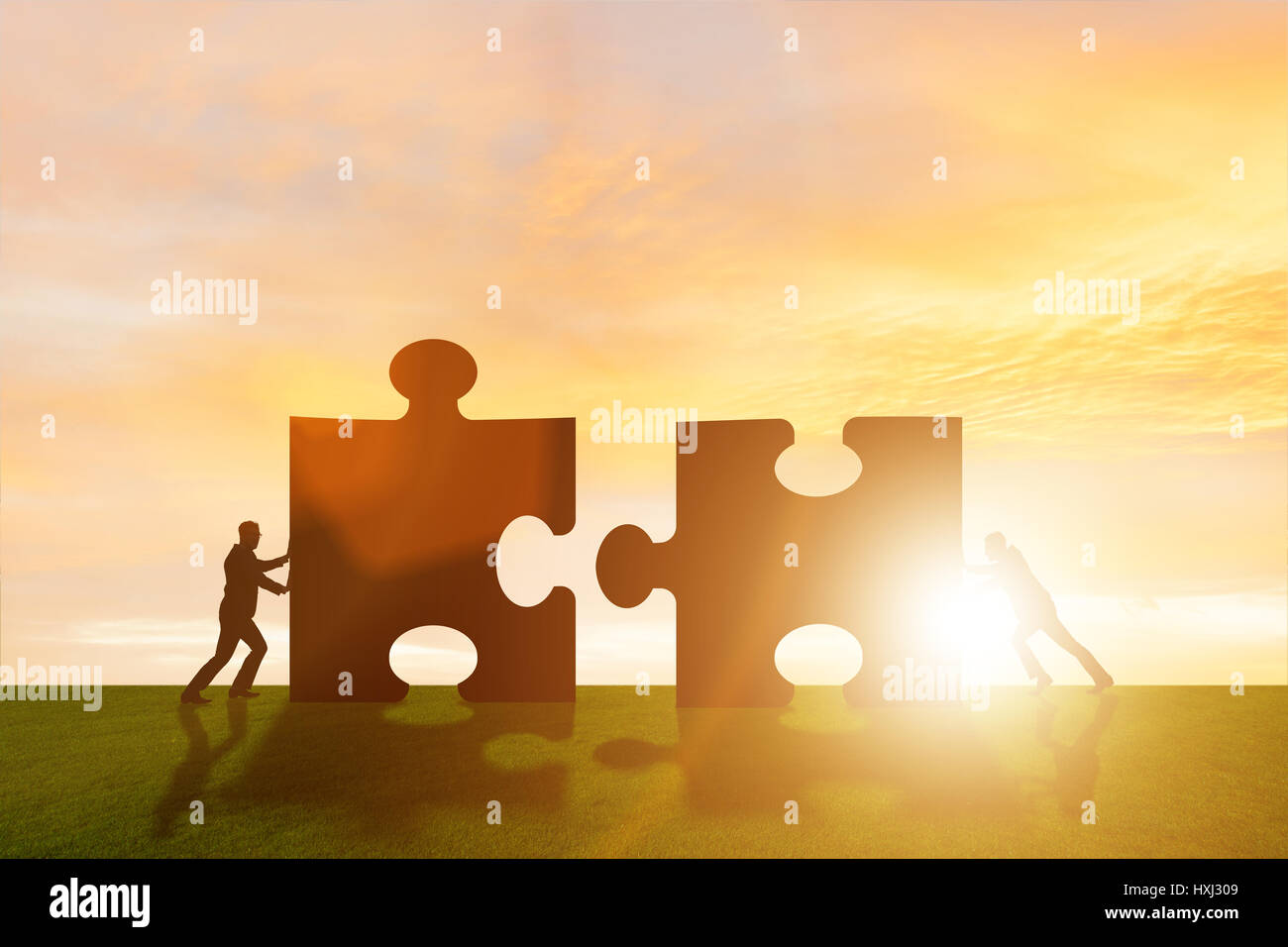 Business metaphor of teamwork with jigsaw puzzle Stock Photo - Alamy