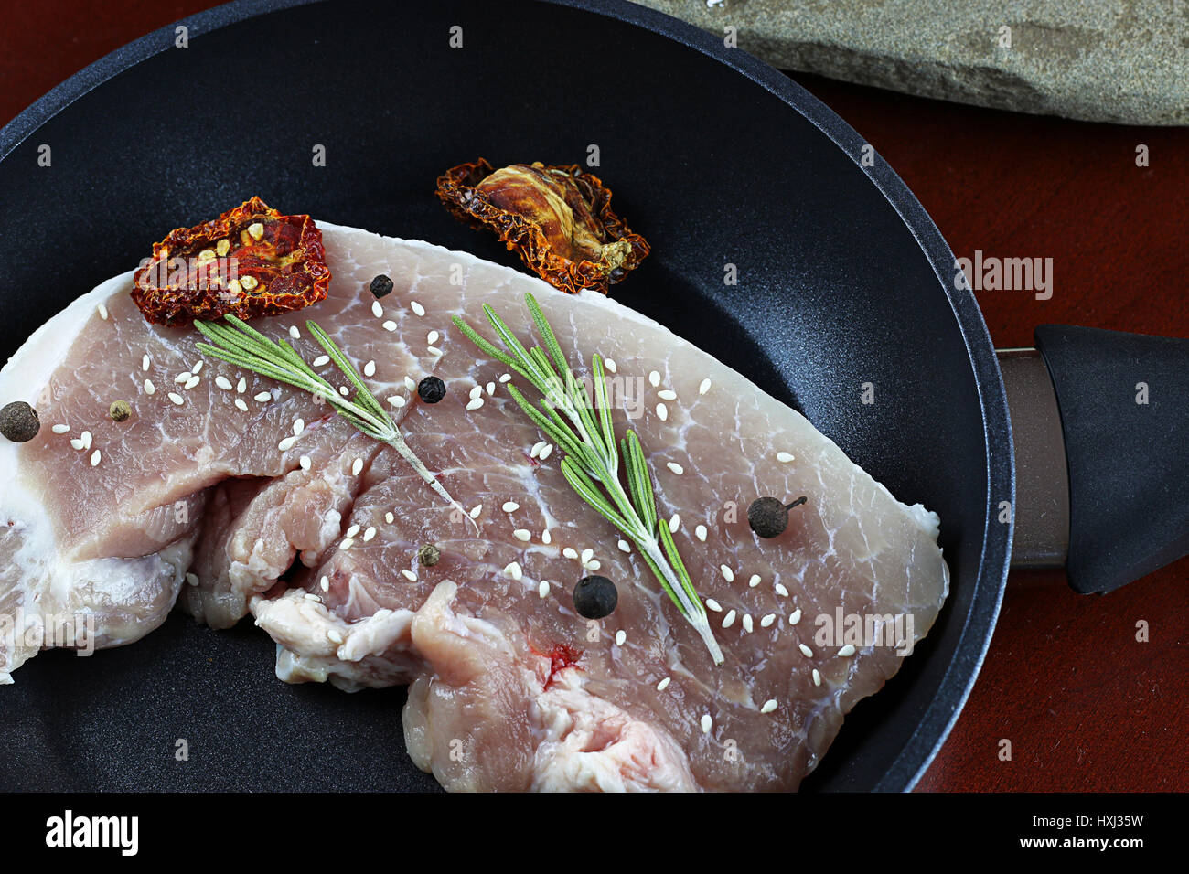 steak in a frying pan Stock Photo - Alamy