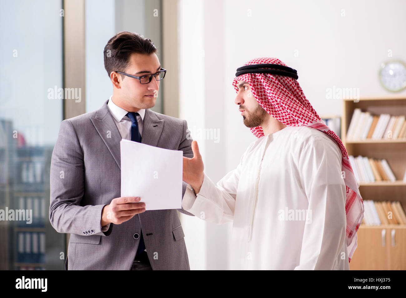 Diverse business concept with arab businessman Stock Photo - Alamy