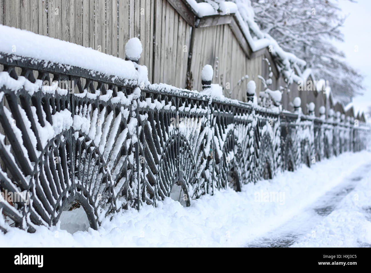 winter wrought fence gates Stock Photo - Alamy