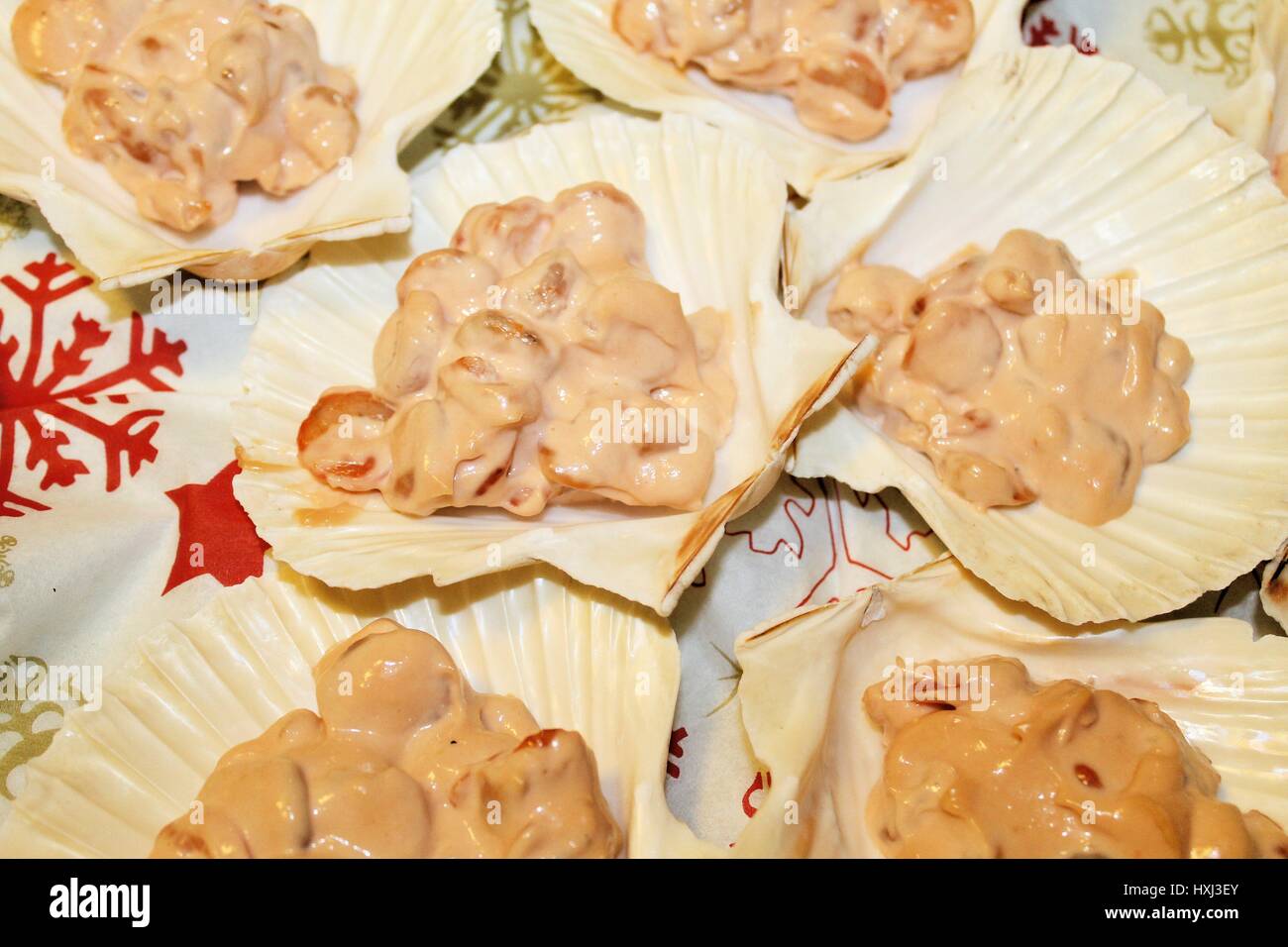 shrimp in pink sauce served in a shell Stock Photo - Alamy