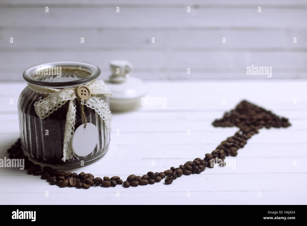 coffee bean arrow Stock Photo - Alamy
