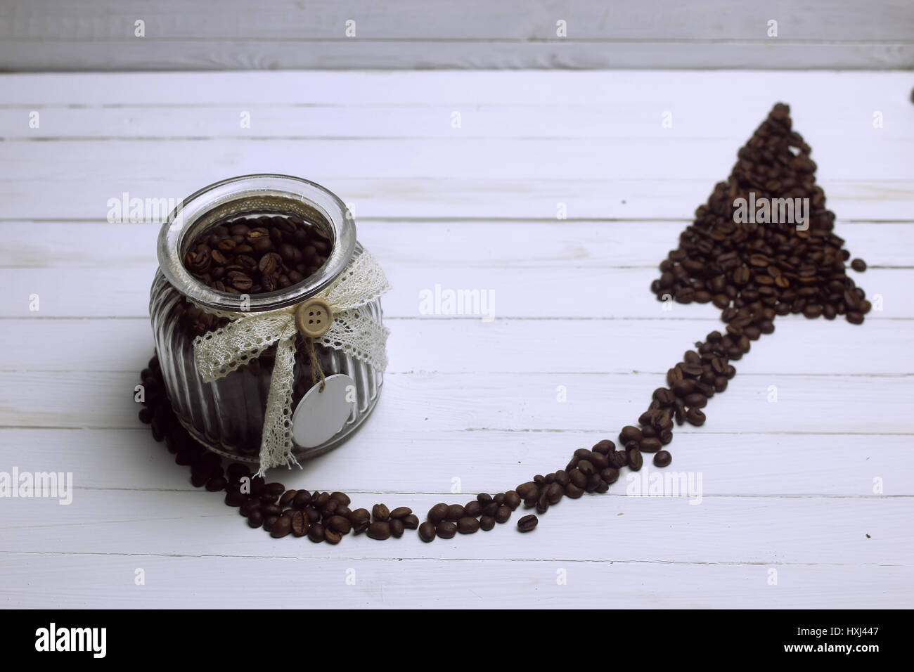 coffee bean arrow Stock Photo - Alamy
