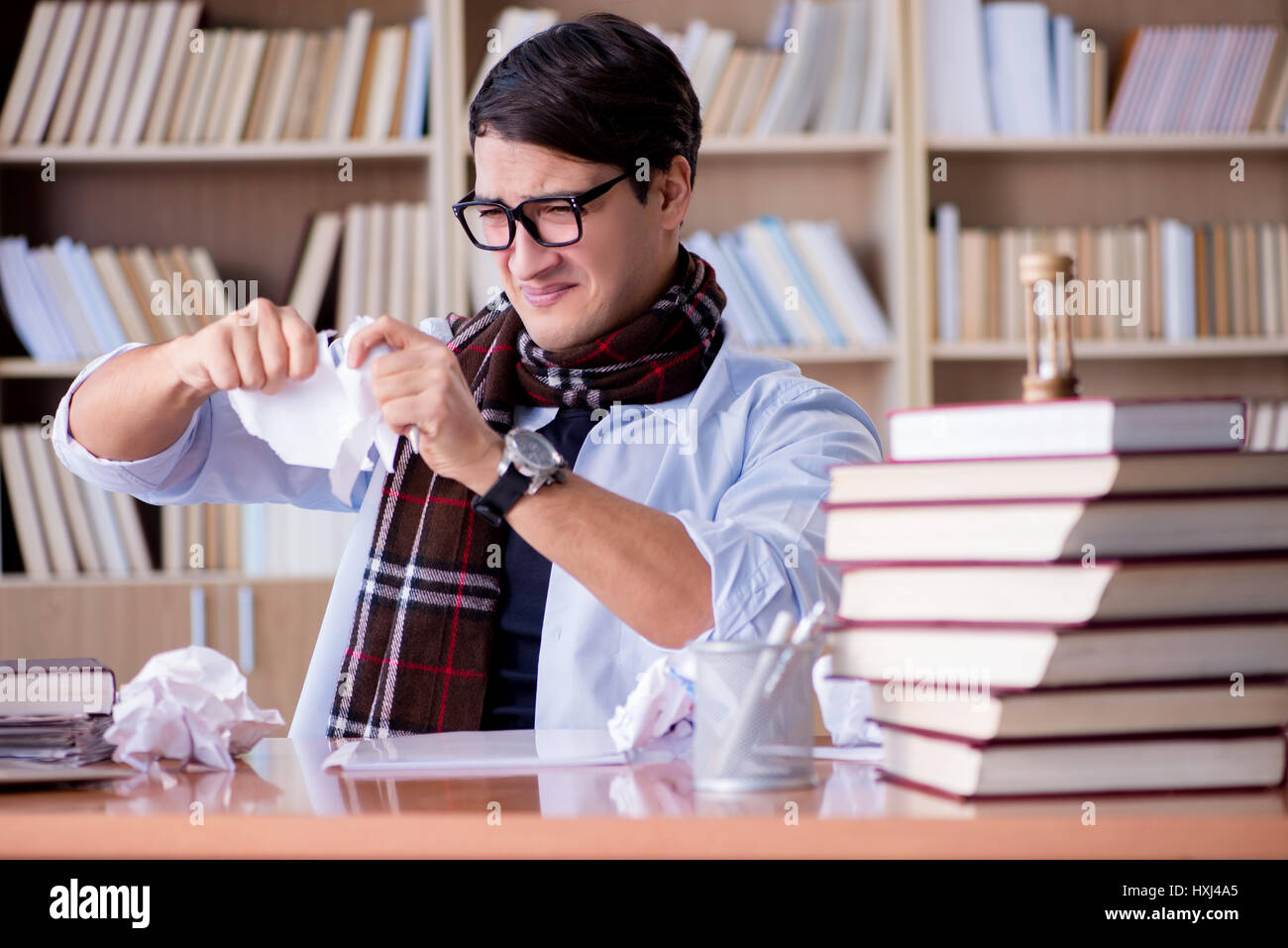 Struggling to study in library hi-res stock photography and images - Alamy