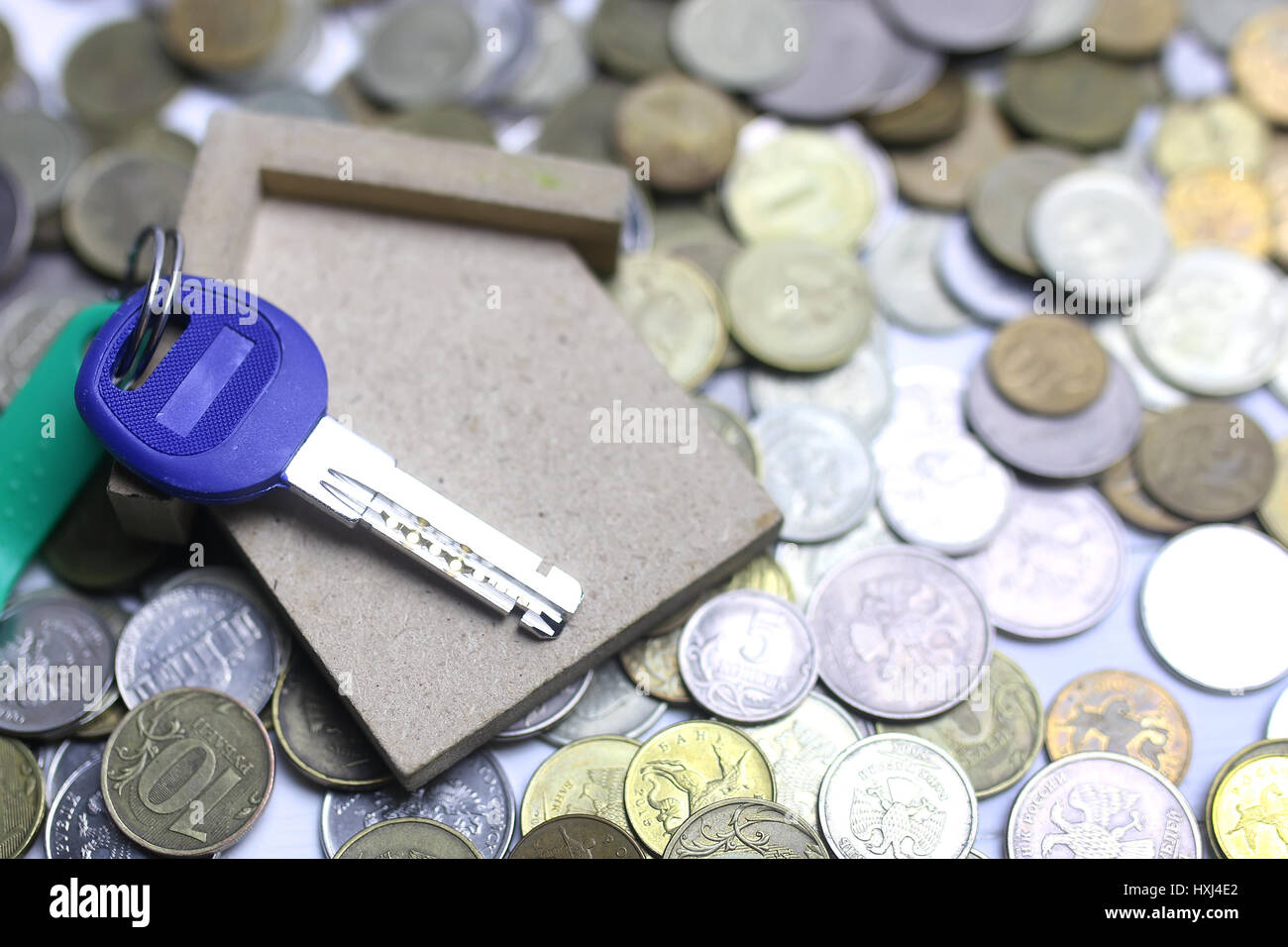 key and russian coins on background Stock Photo - Alamy