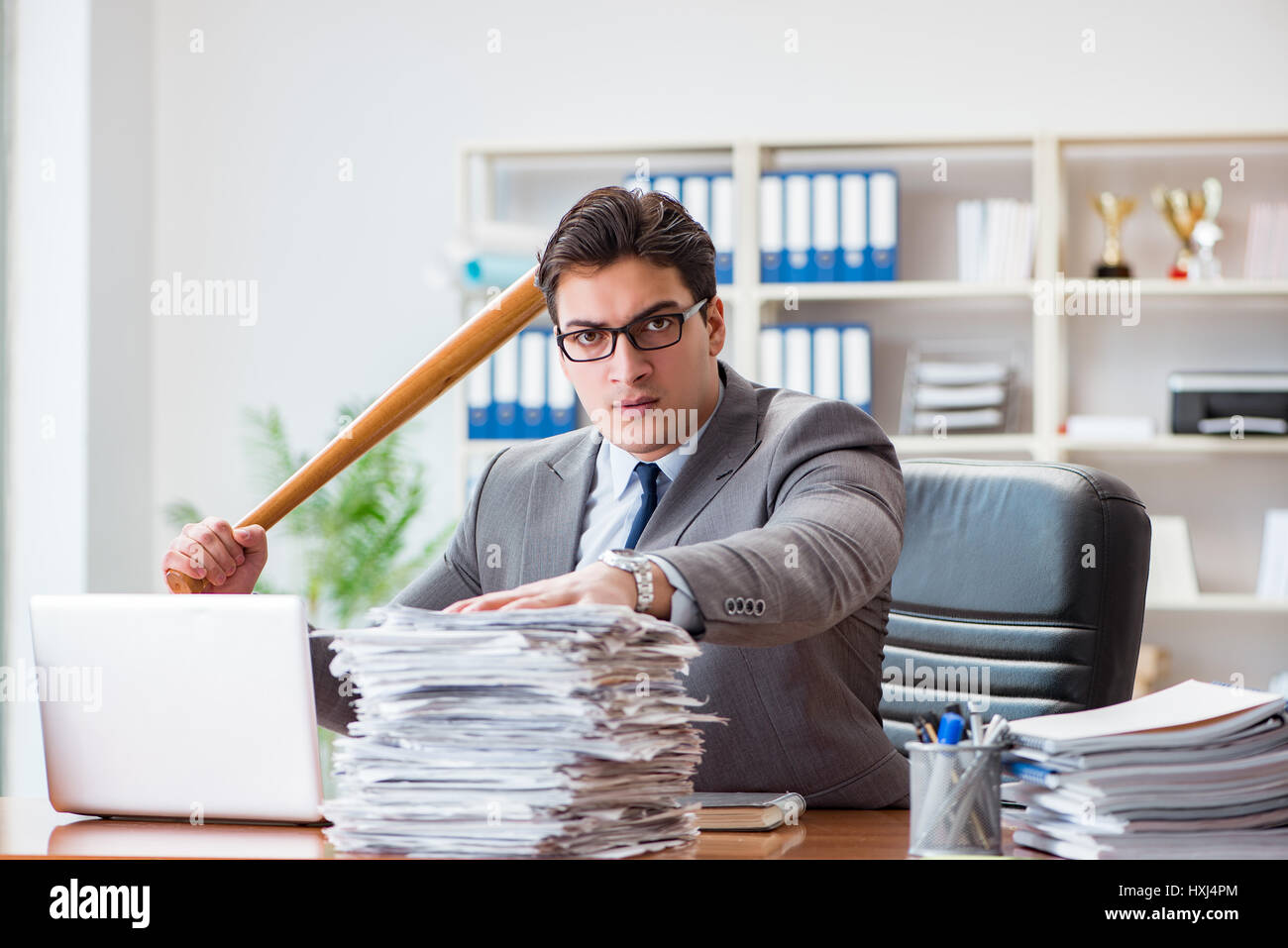 Angry aggressive businessman in the office Stock Photo - Alamy