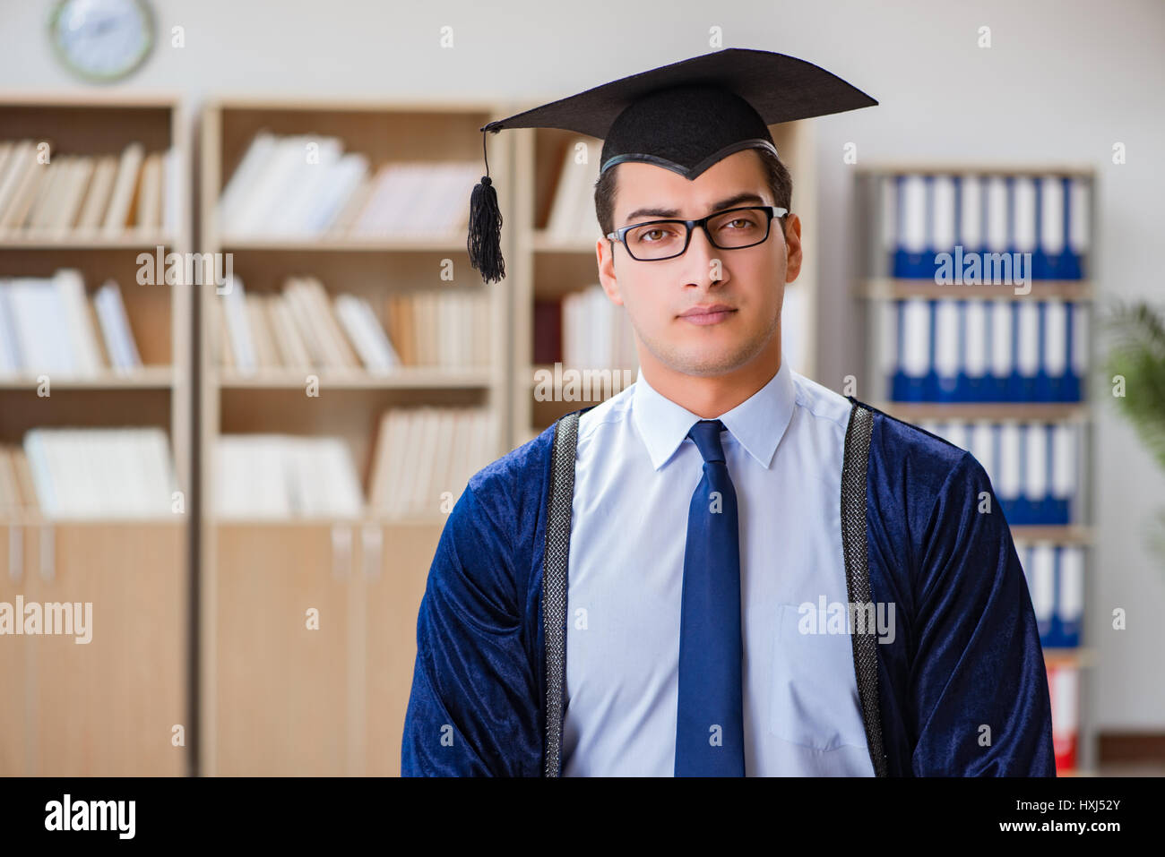 Young man graduating from university Stock Photo - Alamy