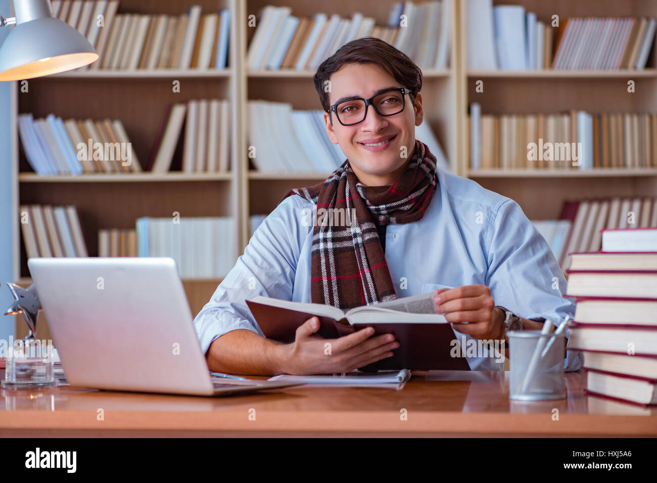 Professional journalist sitting in library hi-res stock photography and ...