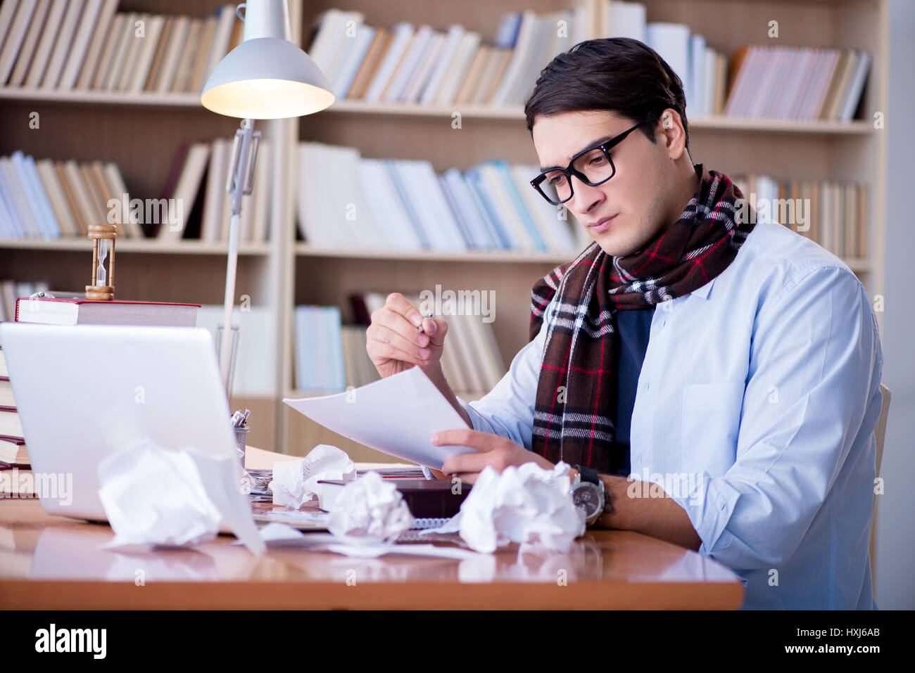 Professional journalist sitting in library hi-res stock photography and ...