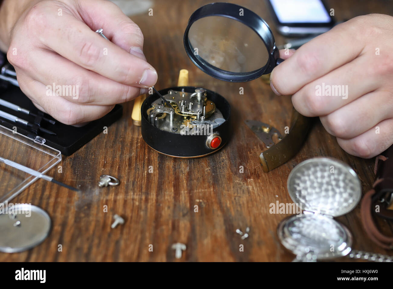 watch clock repair retro concept working hard in a past Stock Photo - Alamy