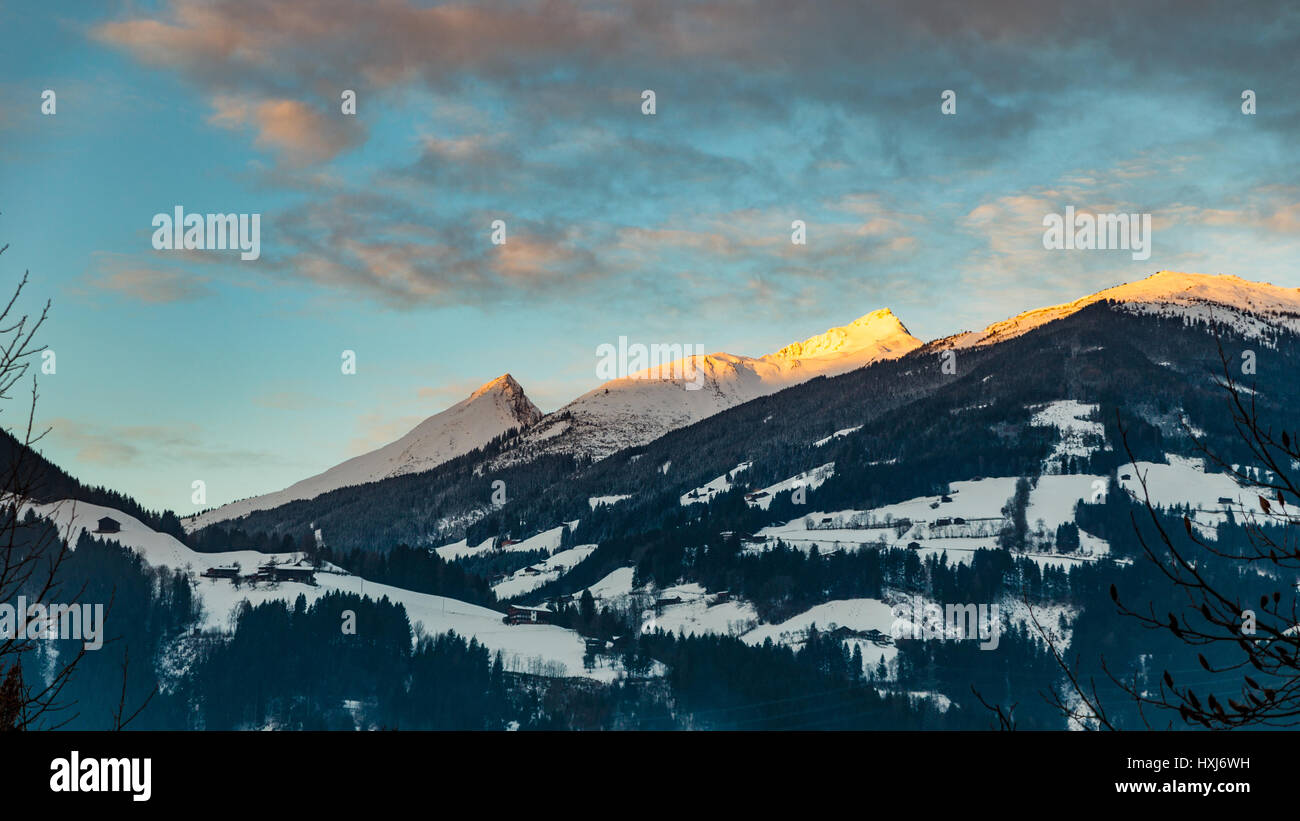alpenglow in winter Stock Photo - Alamy