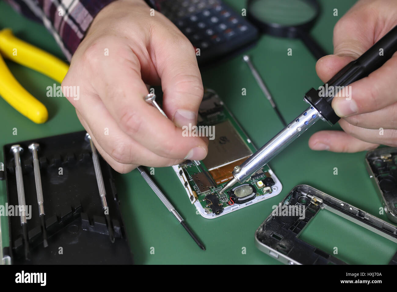 Mobile Phone Repair High Resolution Stock Photography and Images - Alamy