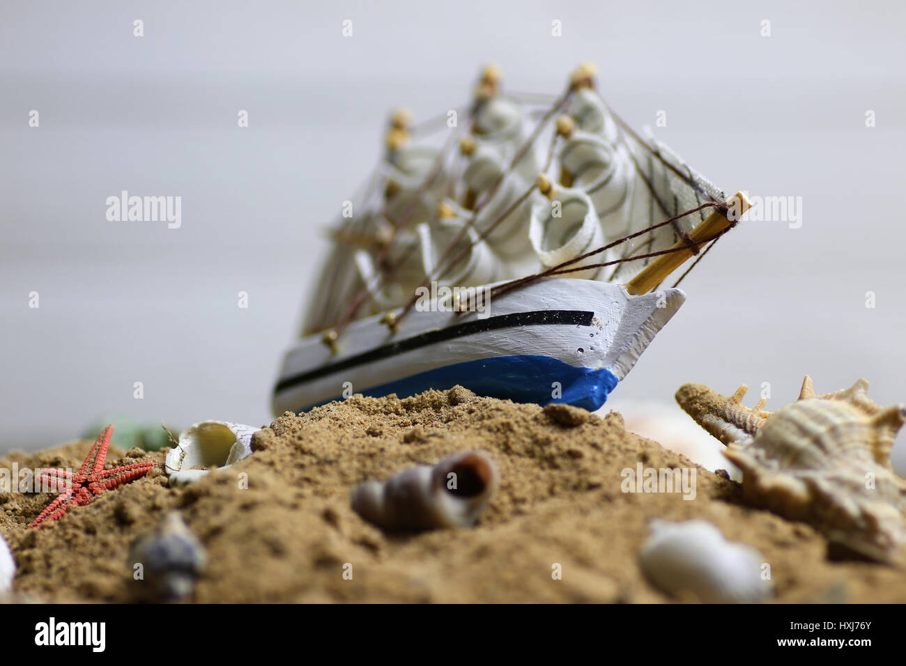 sand shell and sail in sea Stock Photo - Alamy