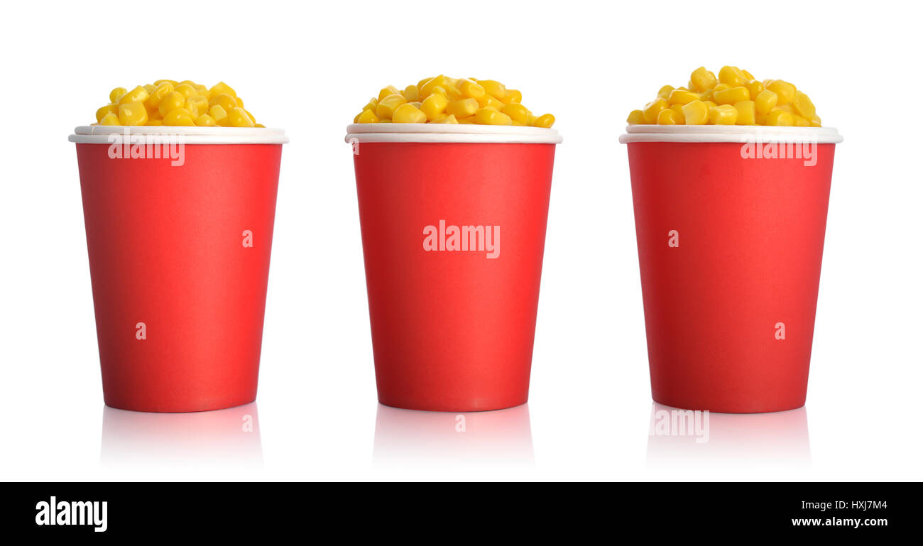Boiled corn kernels in red paper cups isolated on white Stock Photo - Alamy