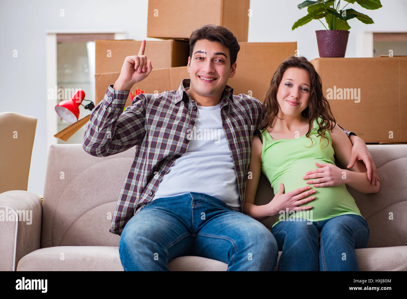 Young couple of man and pregnant wife expecting baby Stock Photo - Alamy