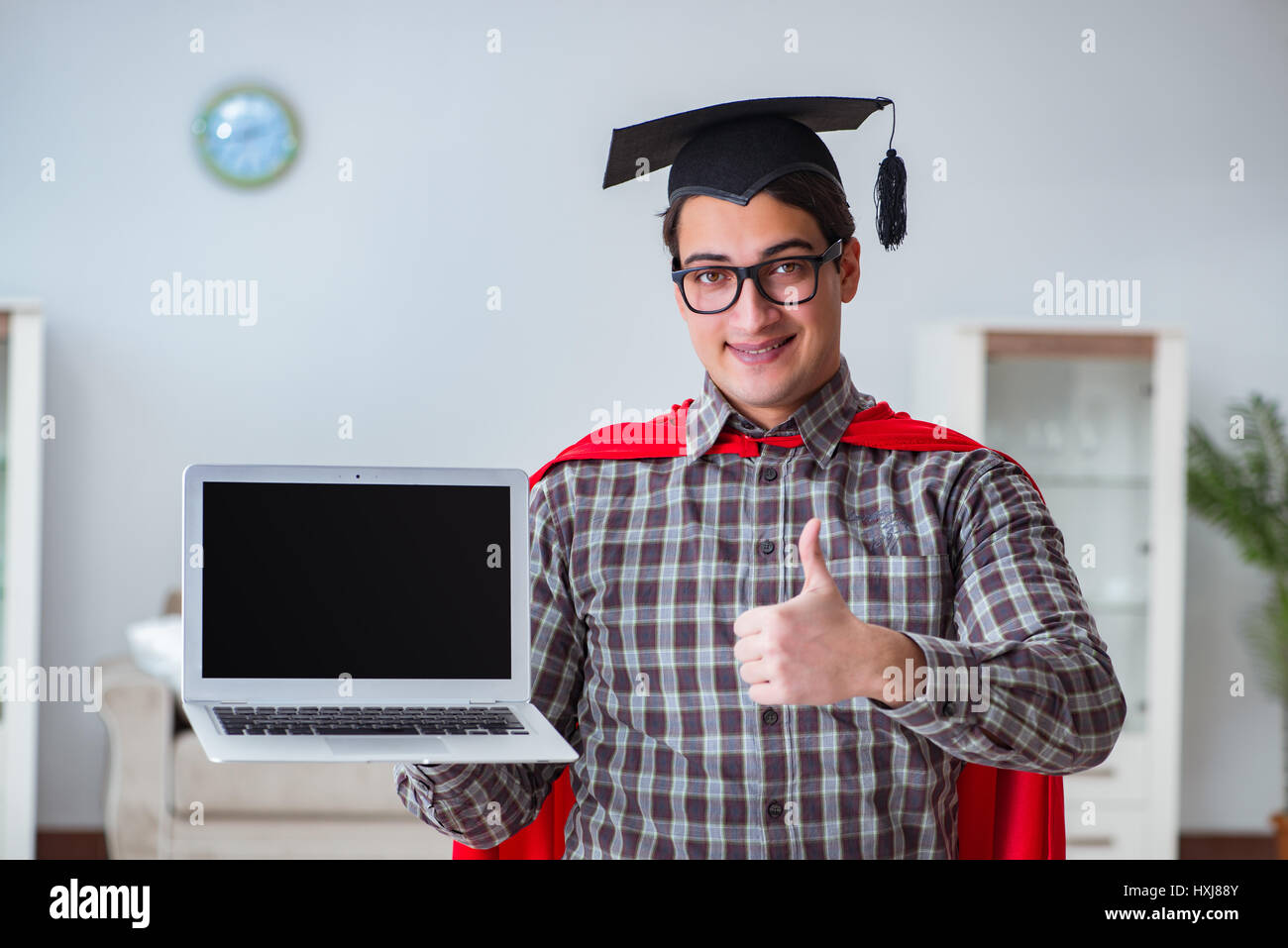 Super hero student with books studying for exams Stock Photo - Alamy