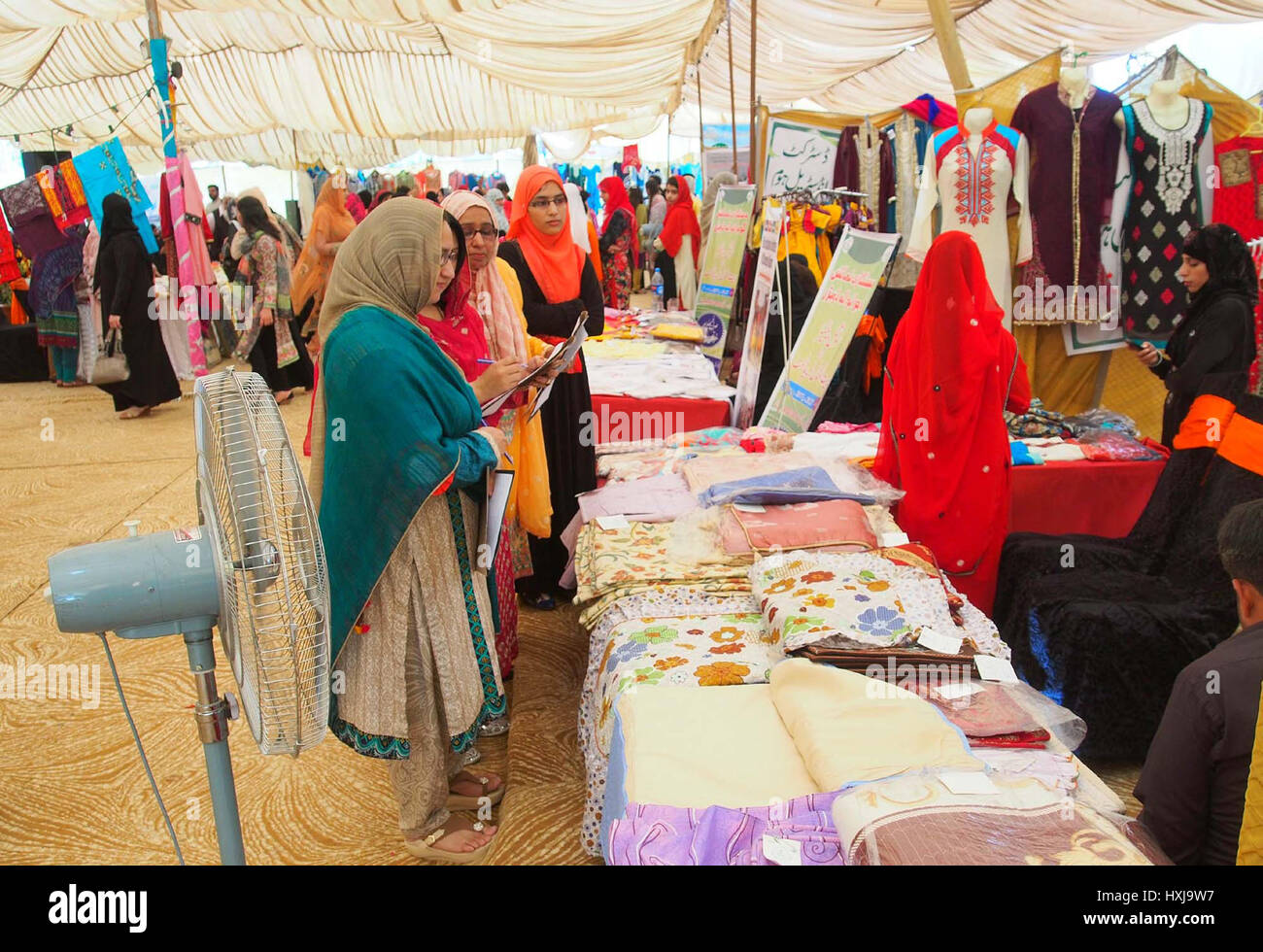 Visitors take keen interest at stall during Handicraft Exhibition ...