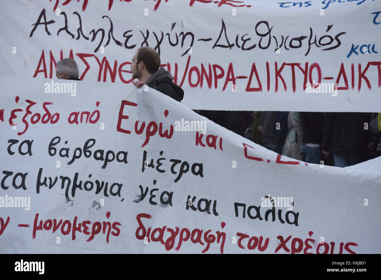 Athens, Greece. 28th Mar, 2017. Protesters shout slogans against the ...