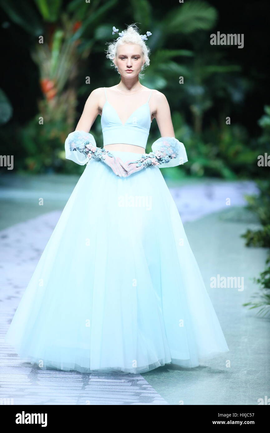 Beijing, China. 28th Mar, 2017. Models present creations of Yu Aiping ...