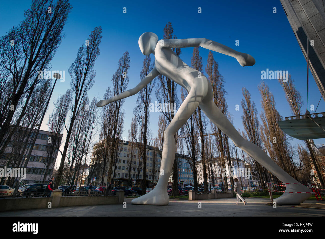 Munich, Germany. 28th Mar, 2017. The Walking Man sculpture by ...