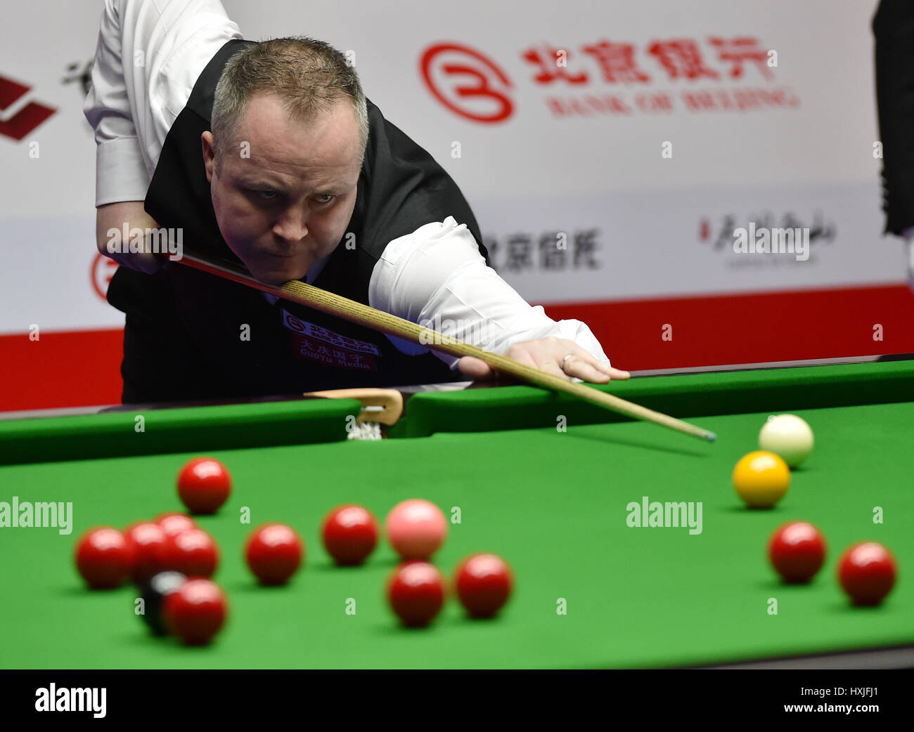 Beijing, China. 29th Mar, 2017. John Higgins of Scotland competes ...
