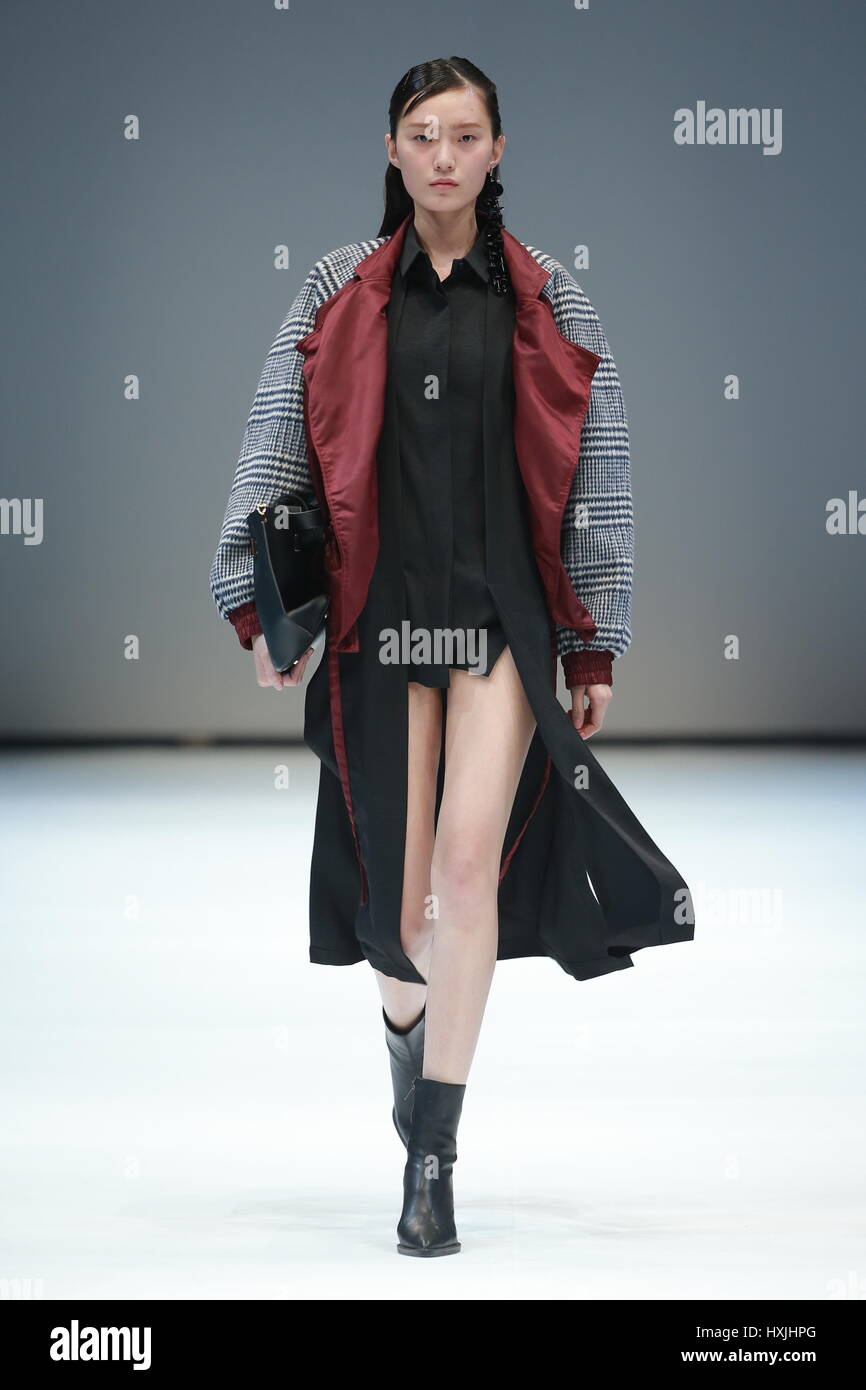 Beijing, China. 29th Mar, 2017. A model presents a creation by Han Dongyang during China Fashion ...