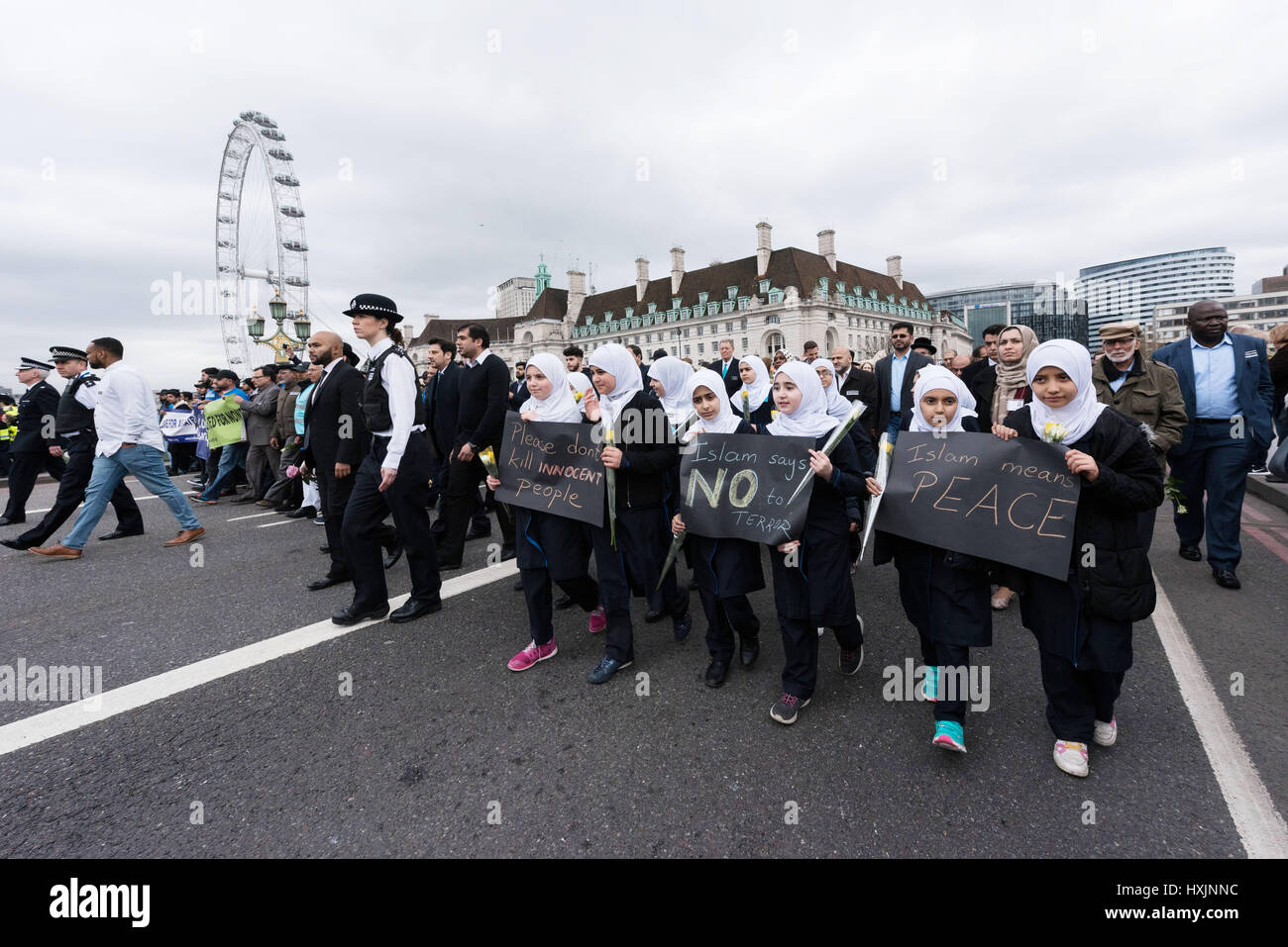 London, UK. 29th Mar, 2017. Police officers and members of muslim ...