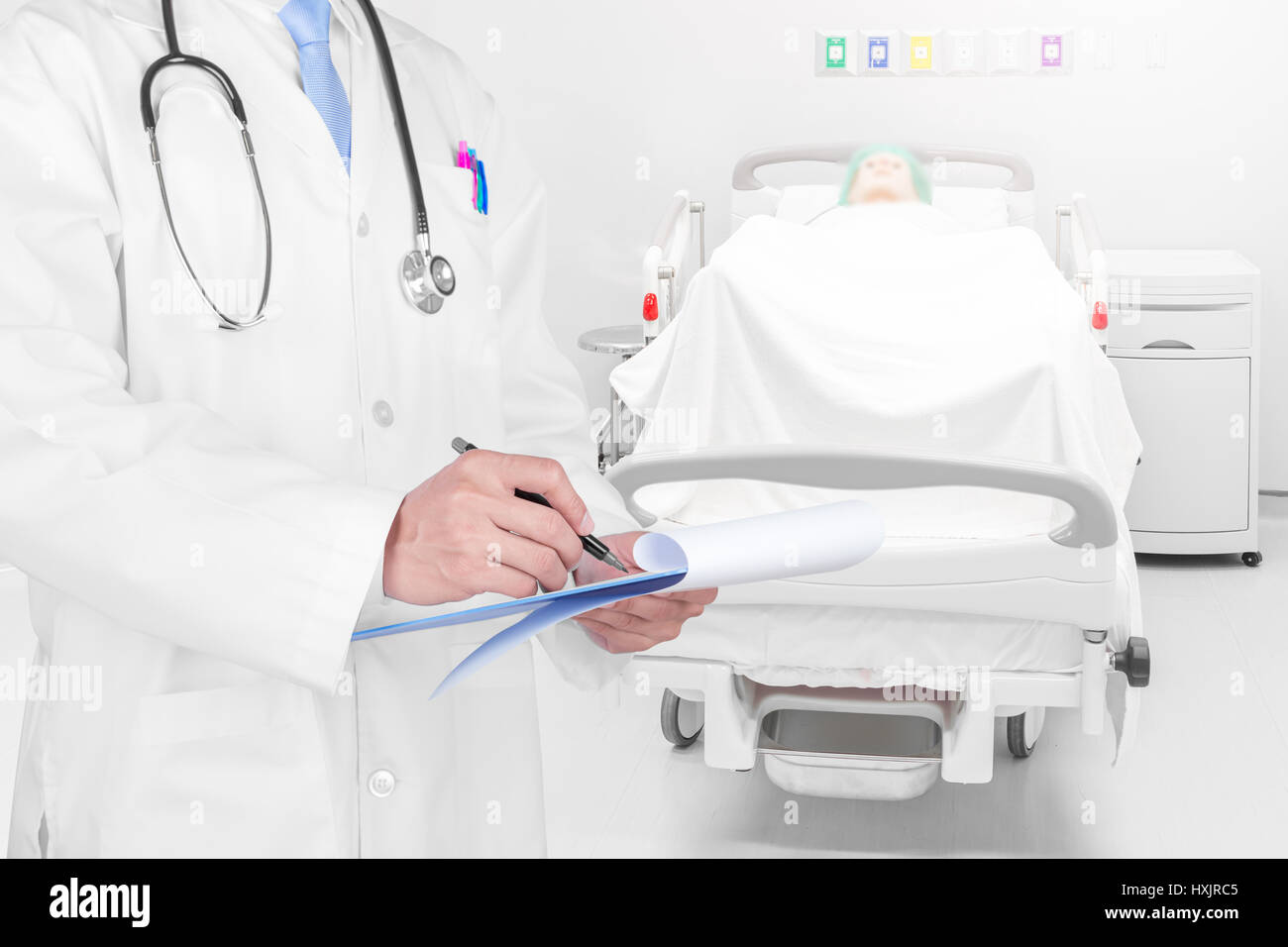 Doctor writing a medical prescription with medical background Stock ...