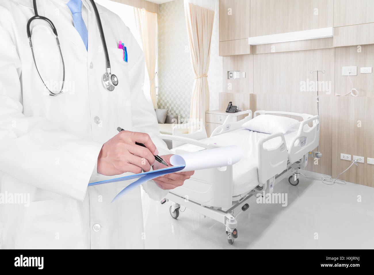 Doctor writing a medical prescription with medical background Stock ...