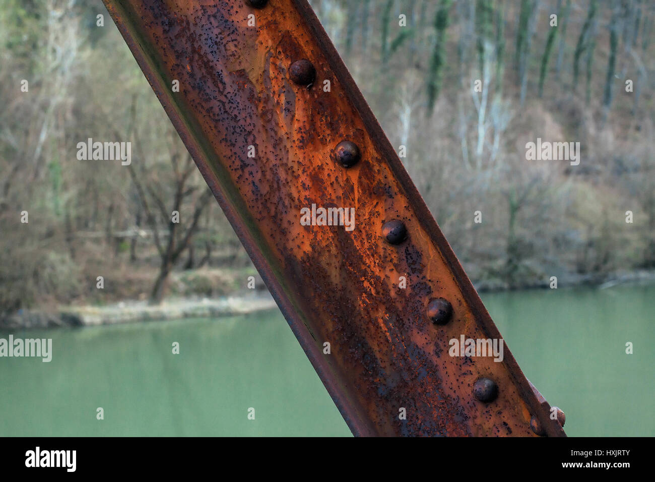 Closeup view of a rusty pillar of the old bridge Stock Photo - Alamy