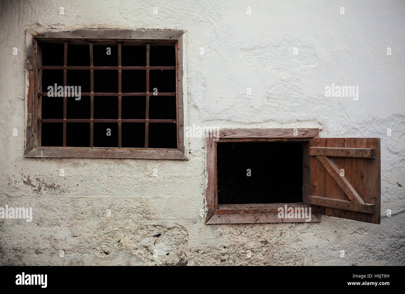 Stable wall and holes with wooden frames Stock Photo - Alamy