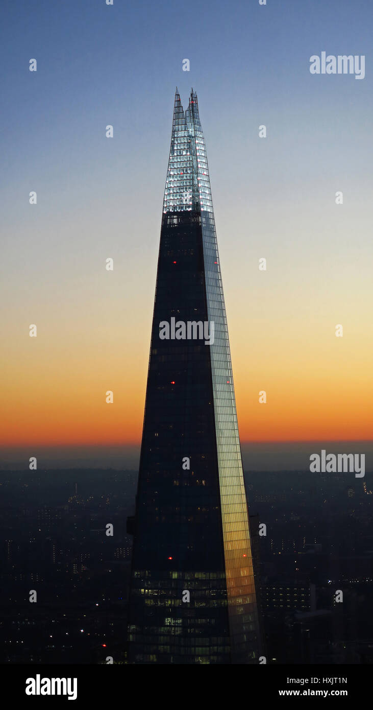 Sunset Shard. The Shard in London depicted at sunset. The orange of the ...