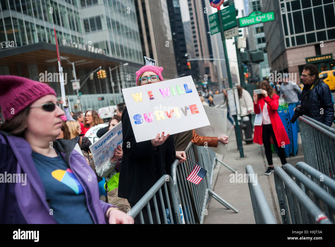 Activists rally in Bryant Park in New York prior to marching to the New ...