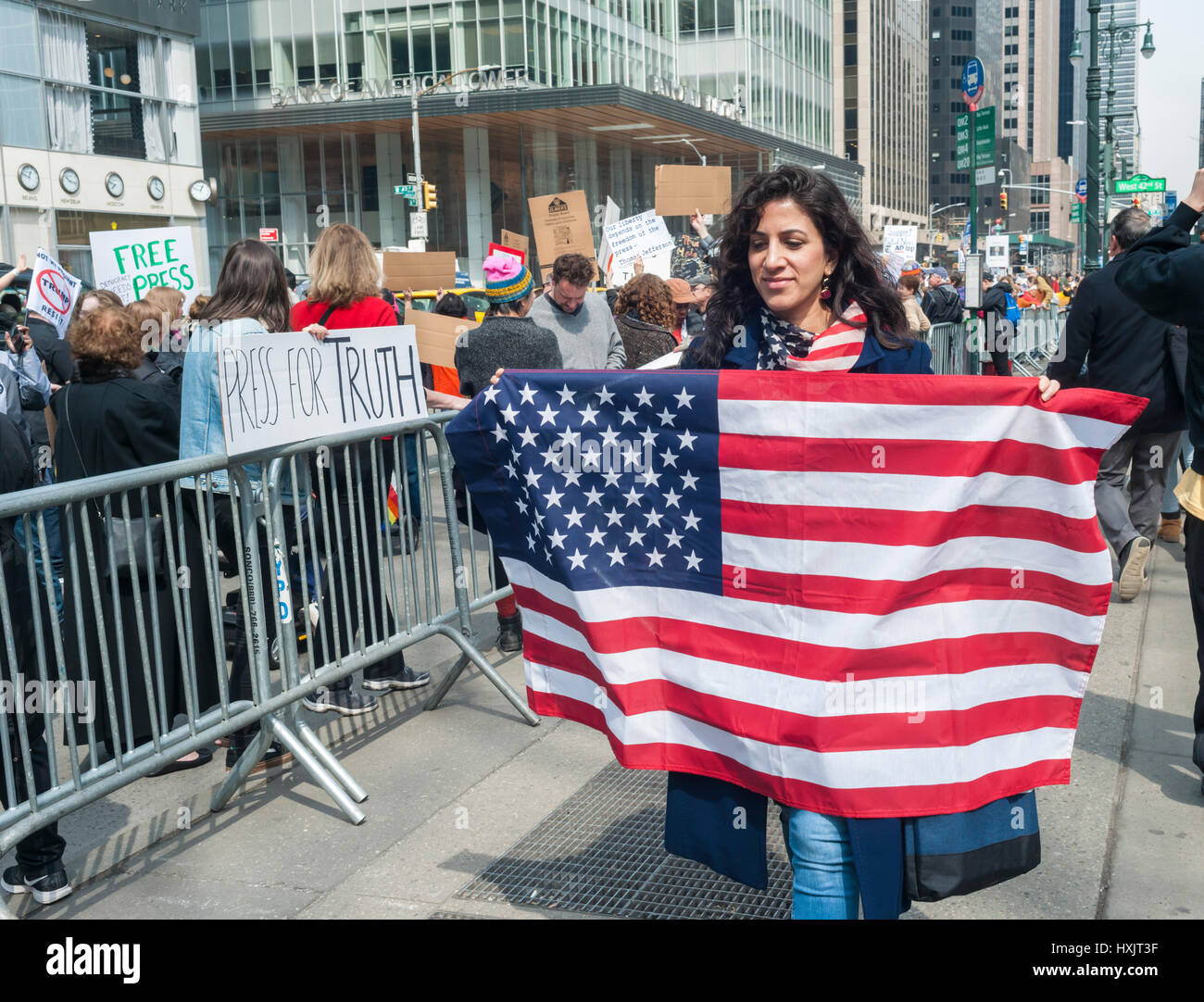Activists rally in Bryant Park in New York prior to marching to the New ...