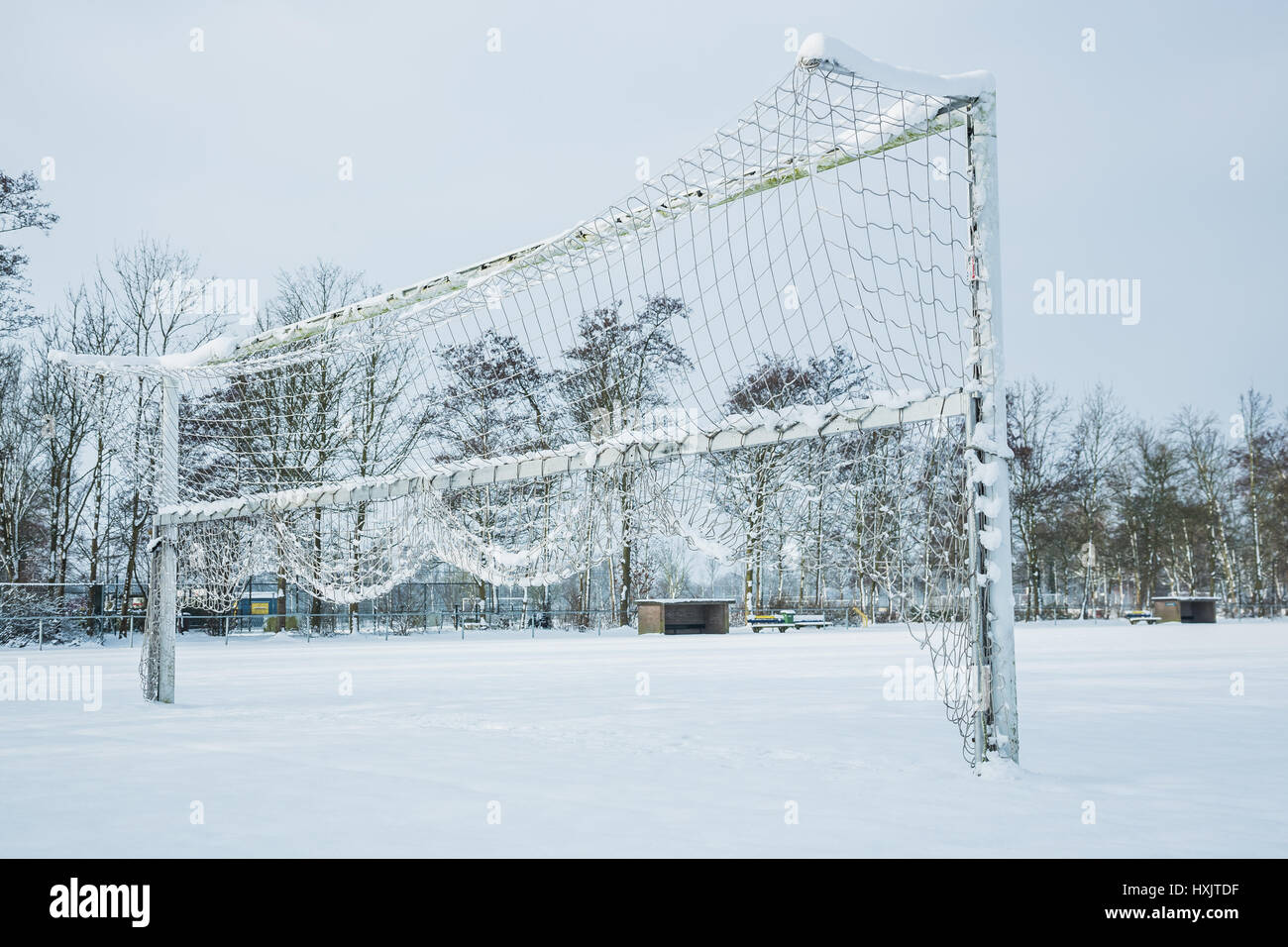 Snow covered soccer field with goal during winter Stock Photo - Alamy