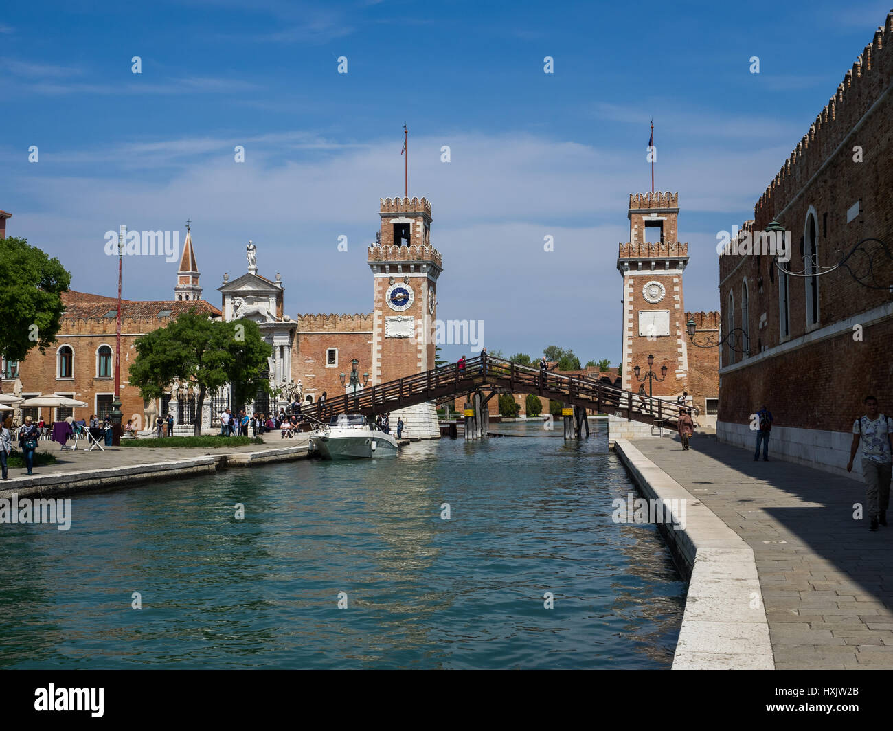 Venetian Naval Arsenal entrance gates with clock tower and canal ...