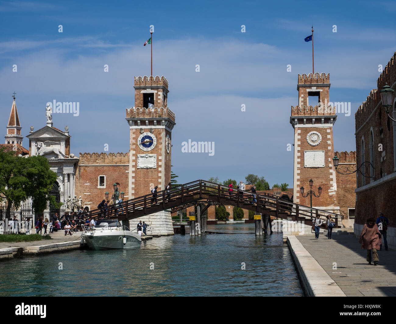 Venetian Naval Arsenal entrance gates with clock tower and canal ...