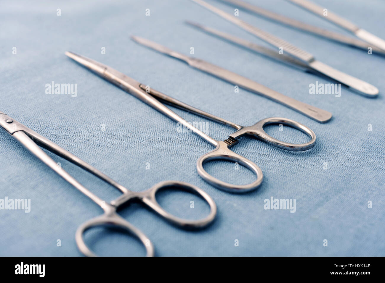 Old surgical instruments and tools including scalpels, forceps and ...