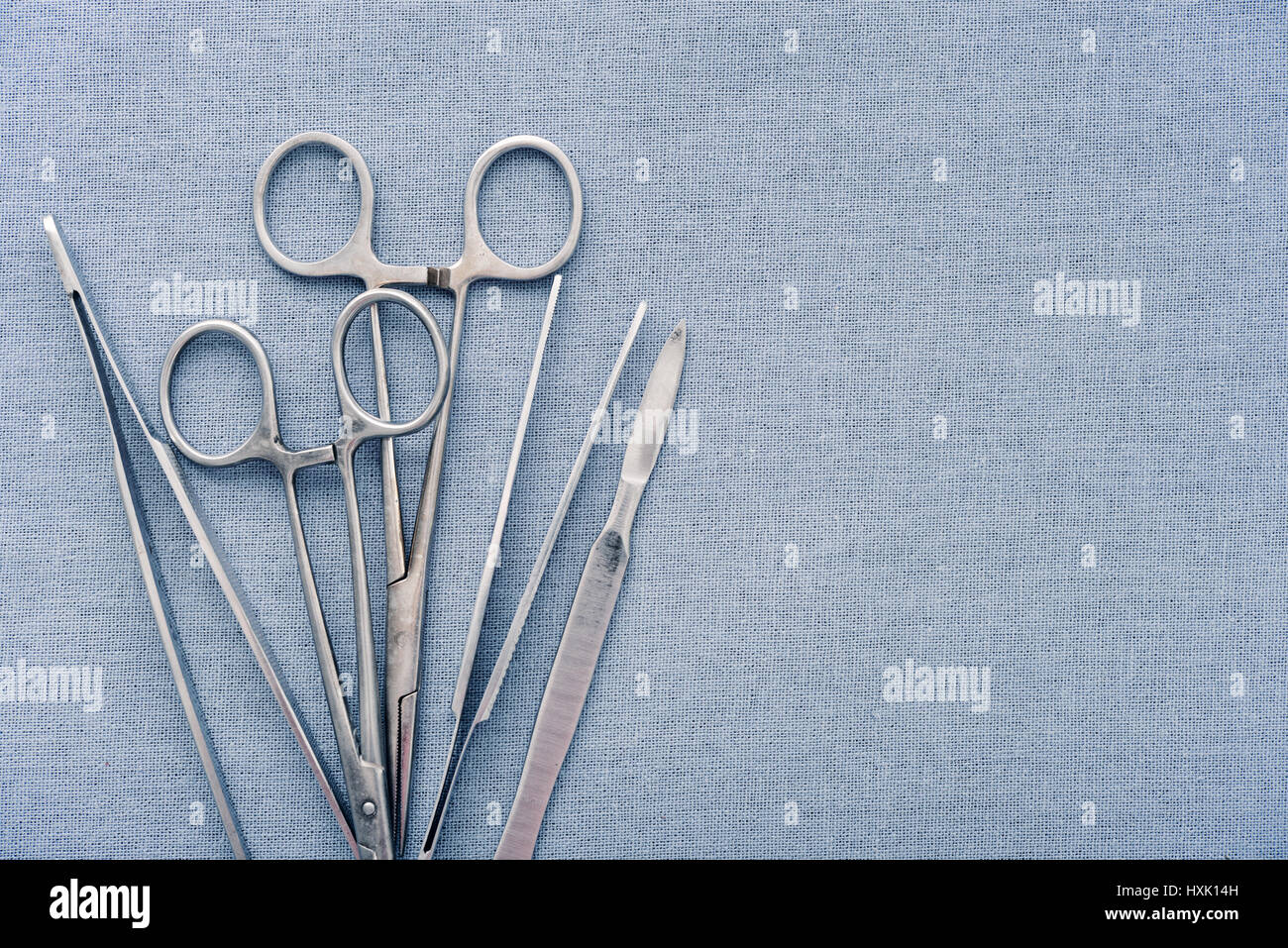 Old surgical instruments and tools including scalpels, forceps and ...
