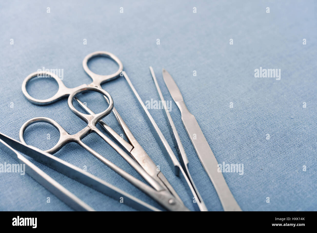 Old surgical instruments and tools including scalpels, forceps and ...