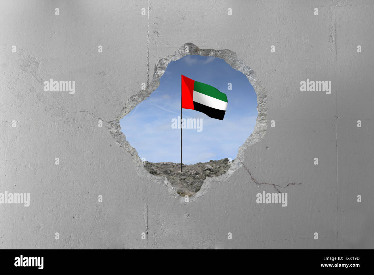 United Arab Emirates's flag behind a concrete wall Stock Photo - Alamy