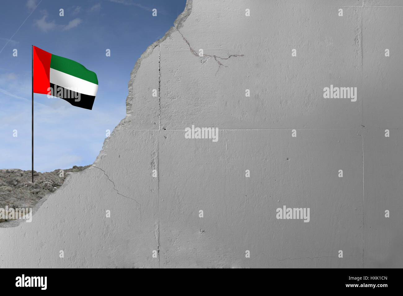United Arab Emirates's flag behind a concrete wall Stock Photo - Alamy