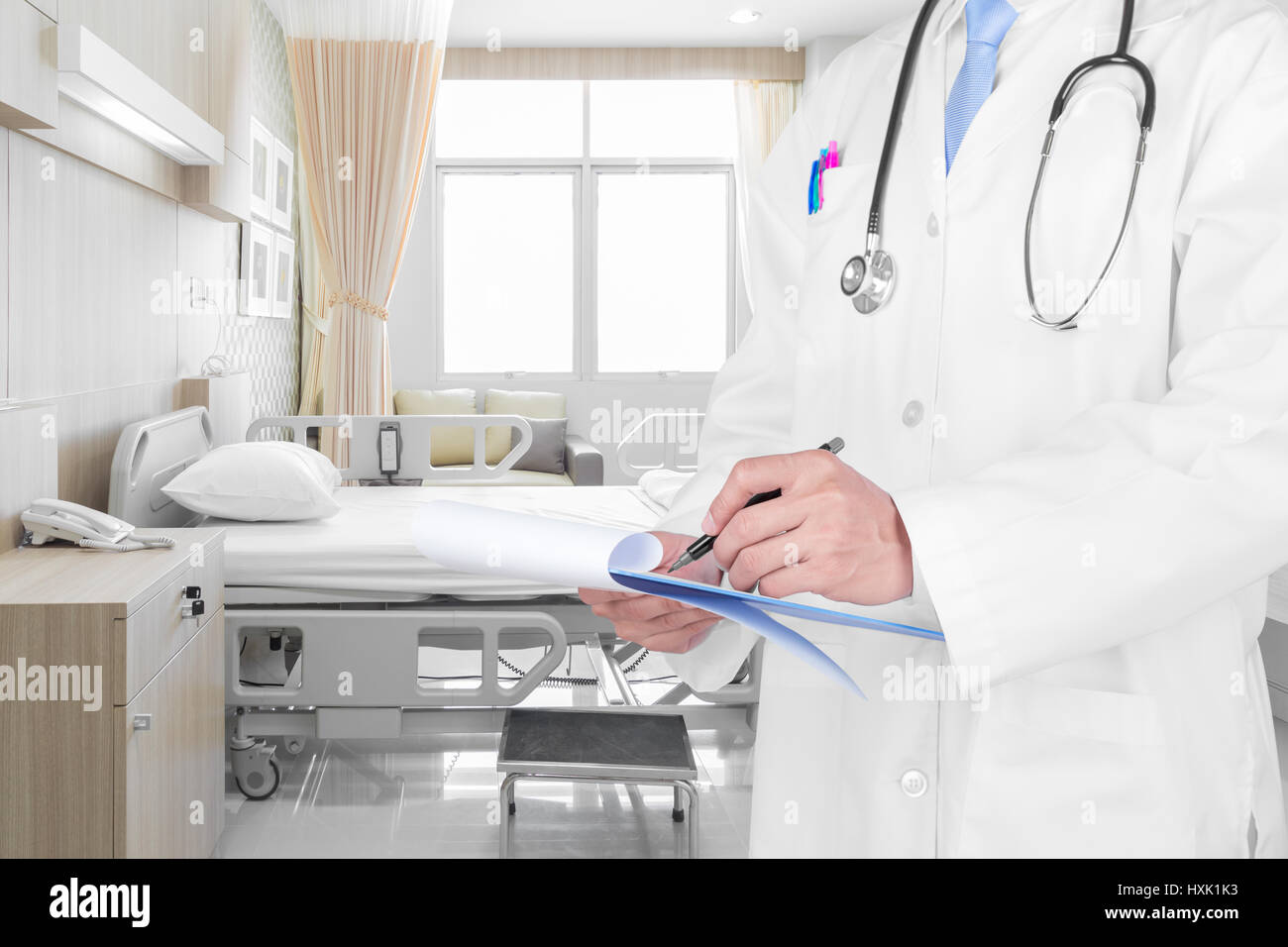 Doctor writing a medical prescription with medical background Stock ...