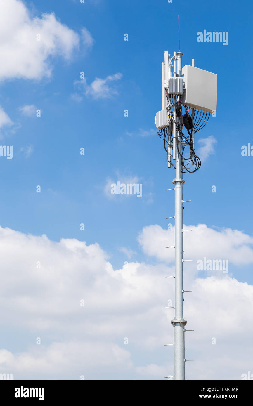 cellular transmitter with blue sky Stock Photo - Alamy
