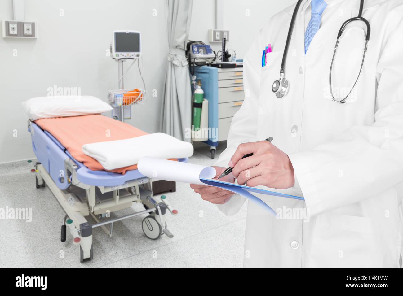 Doctor writing a medical prescription with medical background Stock ...