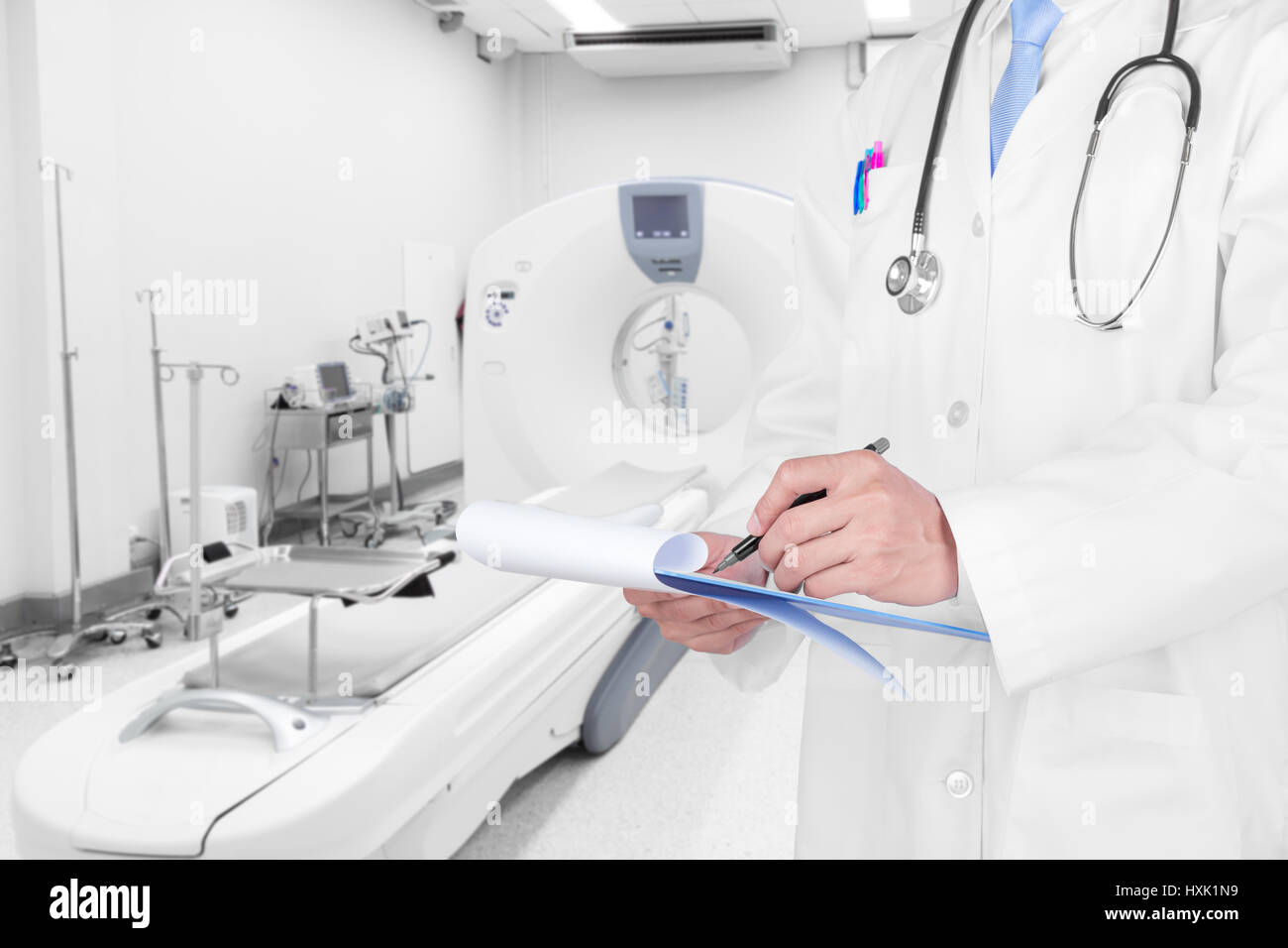 Doctor writing a medical prescription with medical background Stock ...
