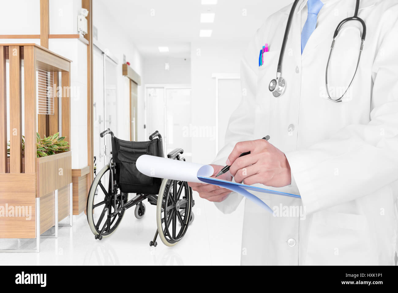 Doctor writing a medical prescription with medical background Stock ...