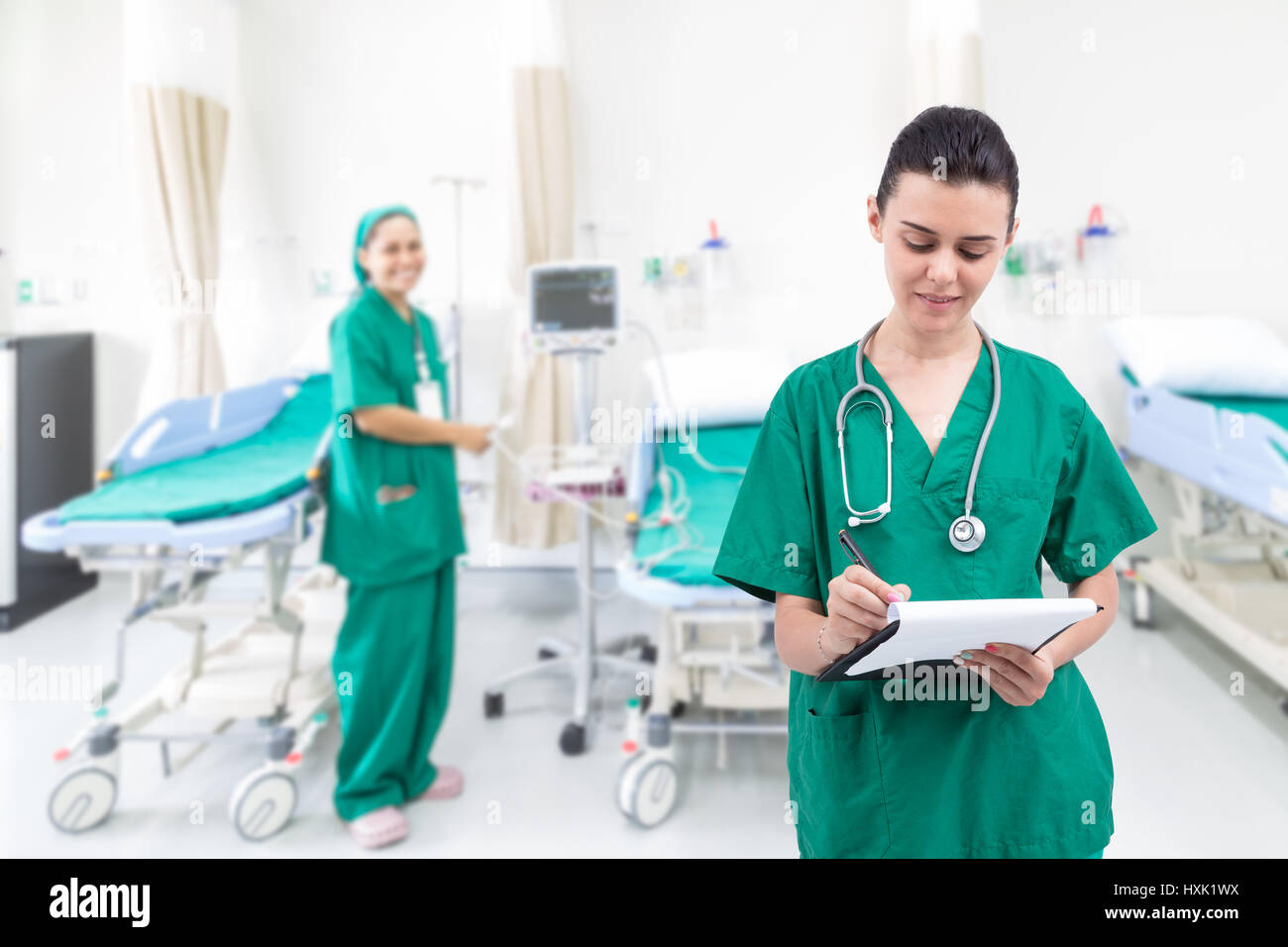 Nurse thinking writing hi-res stock photography and images - Alamy
